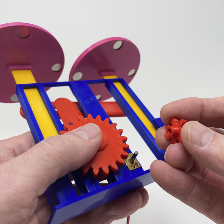 3D Printable A 3D Printed Slinky Machine by Greg Zumwalt