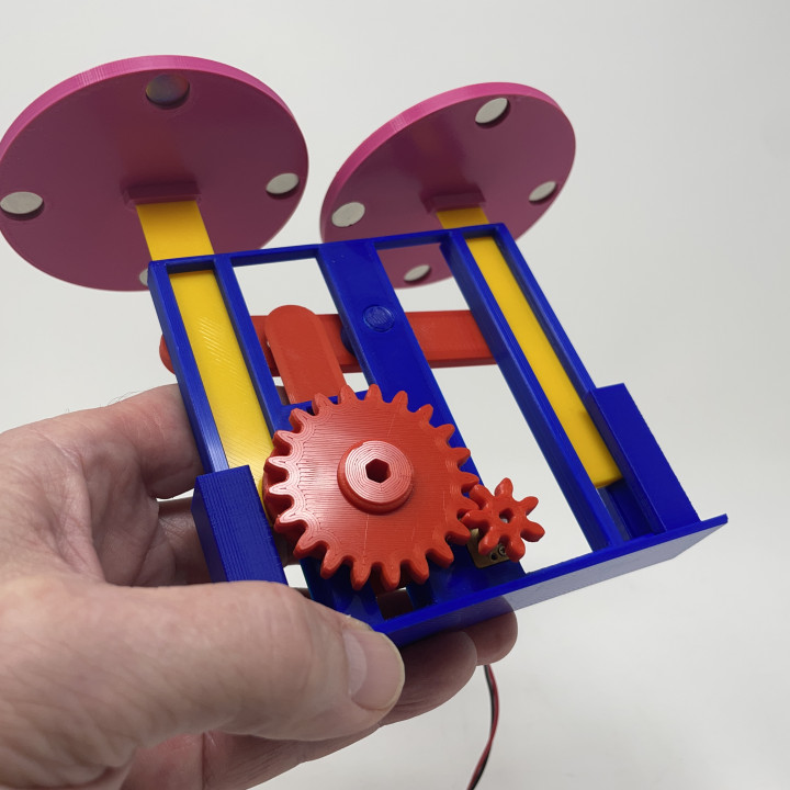 3D Printable A 3D Printed Slinky Machine by Greg Zumwalt