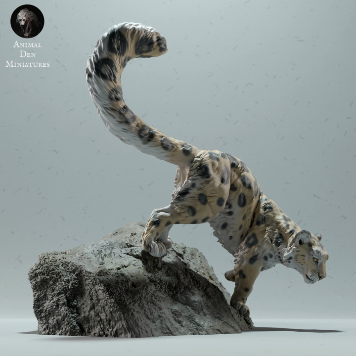 3D Printable Snow Leopard on a Boulder by Animal Den Miniatures