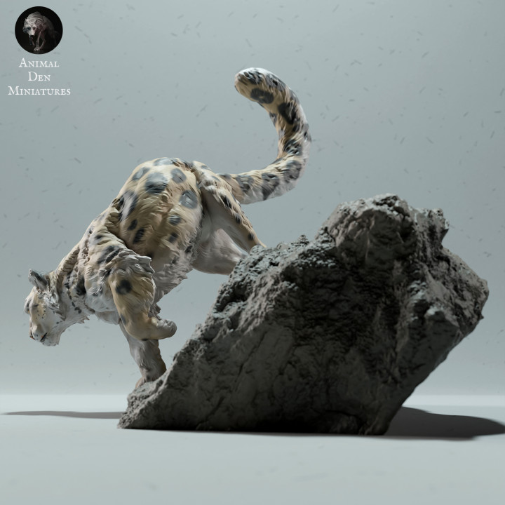 3D Printable Snow Leopard on a Boulder by Animal Den Miniatures
