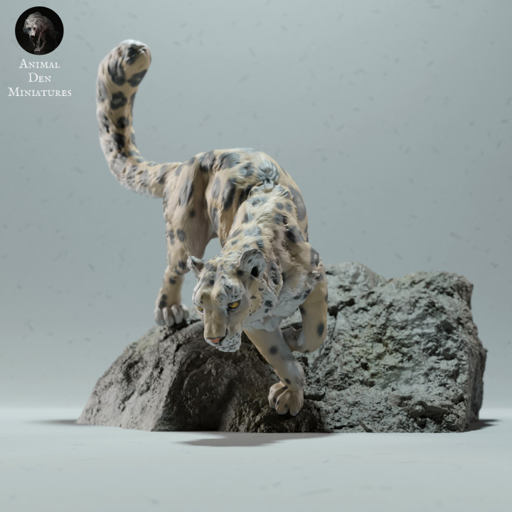 3D Printable Snow Leopard on a Boulder by Animal Den Miniatures