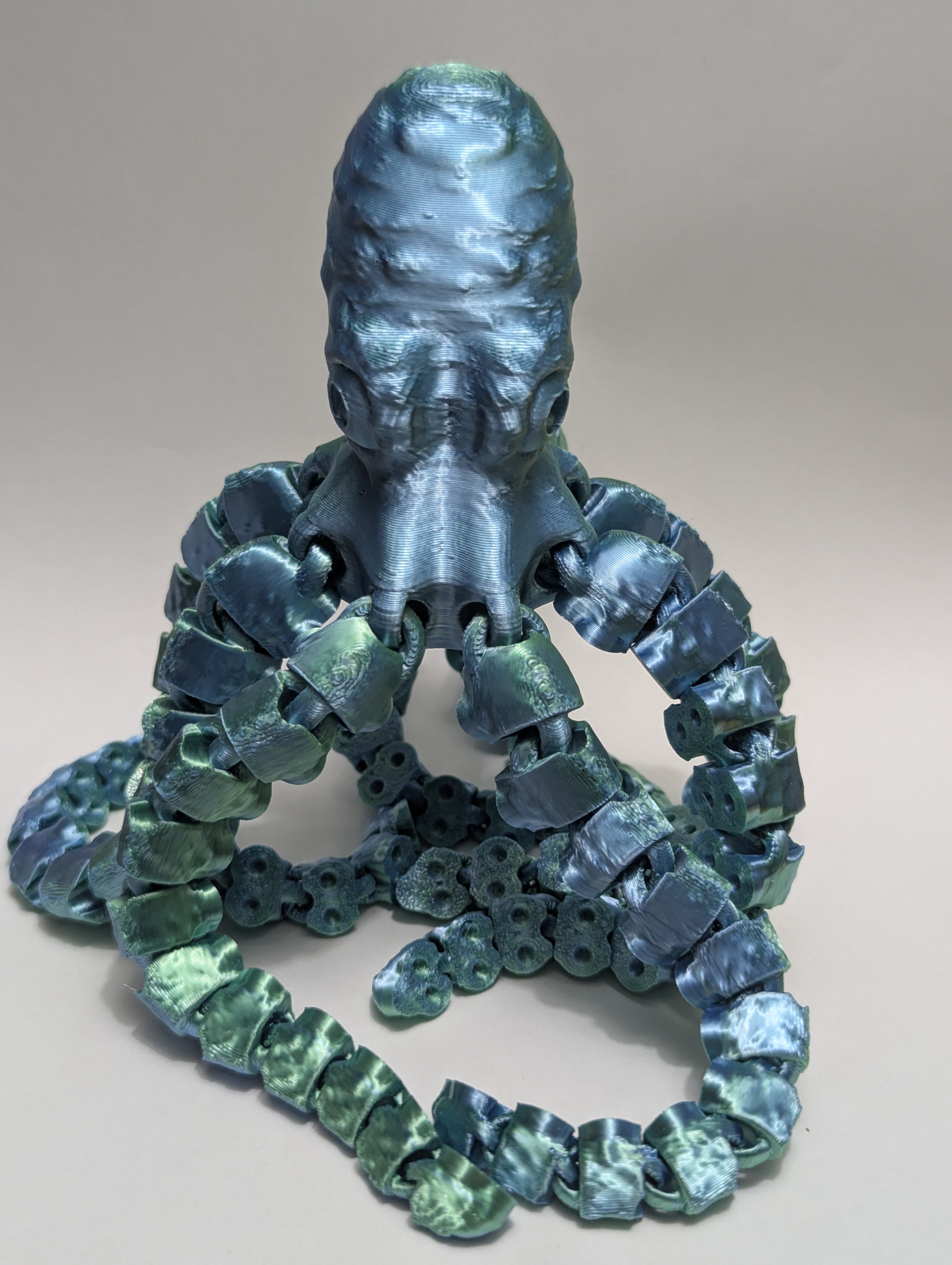 3D Printable Flexy Octopus and Juvenile by The Dragon's Den