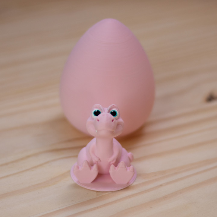 3D Printable SURPRISE EGG (T-REX BABY) by Rogi Studios
