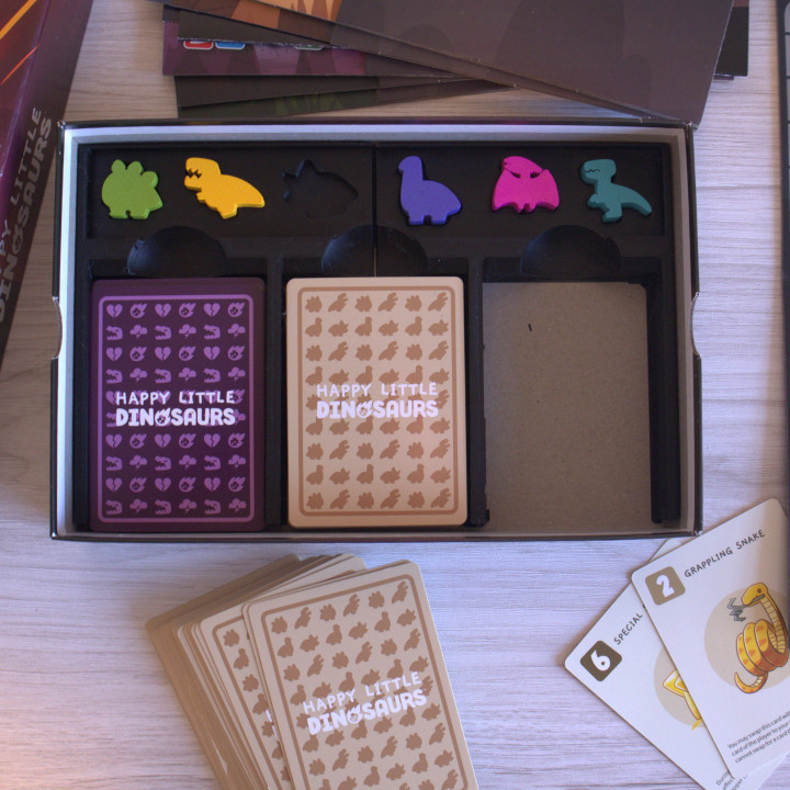 3D Printable Happy little dinosaurs insert for 5-6 players by Jonathan ...