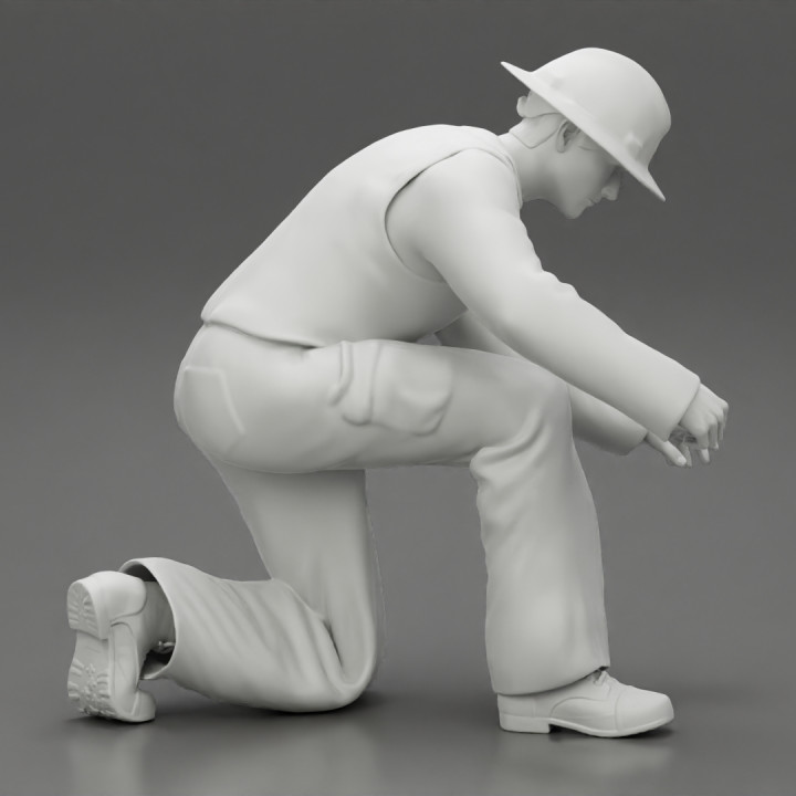 3D Printable Industry worker sitting and fixing technical issues by ...