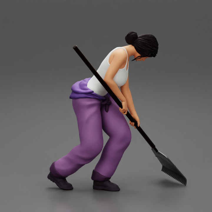 3D Printable Woman farmer working field with a rake by 3DGeschaft ...