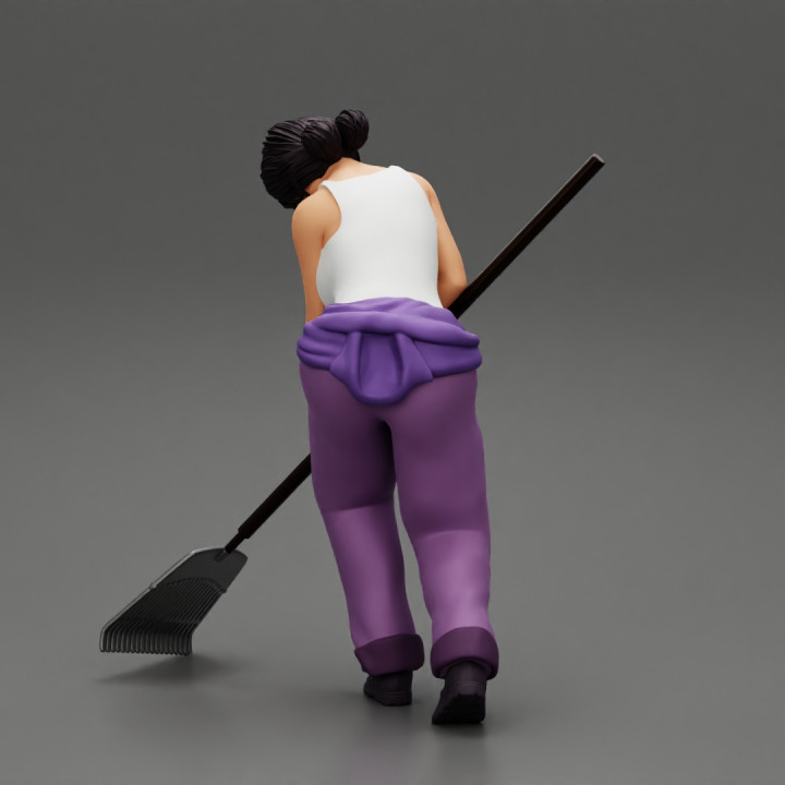 3D Printable Woman farmer working field with a rake by 3DGeschaft ...