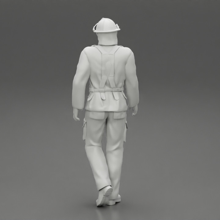 3D Printable Firefighter walking by 3DGeschaft Miniatures Figures