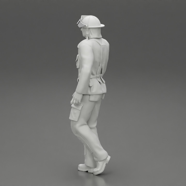 3D Printable Firefighter walking by 3DGeschaft Miniatures Figures