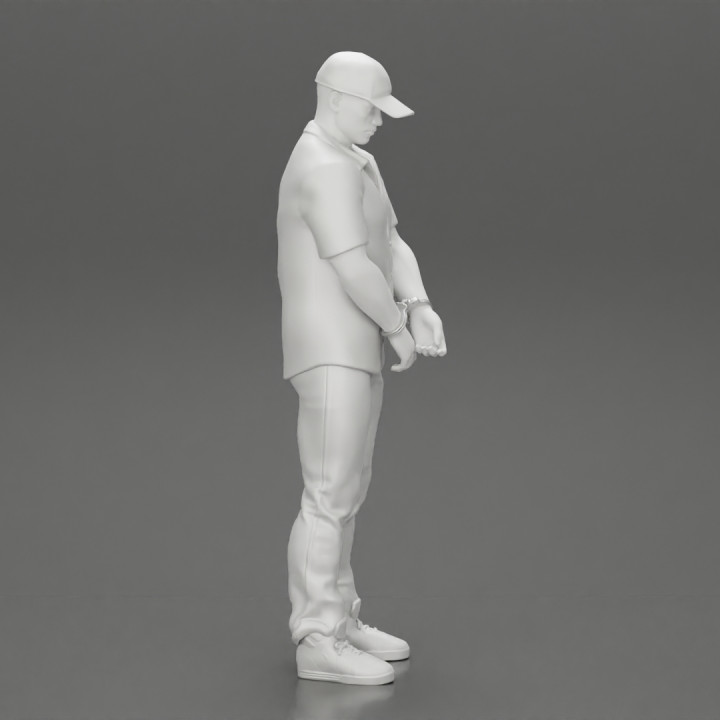3D Printable handcuff man in cap standing by 3DGeschaft Miniatures Figures