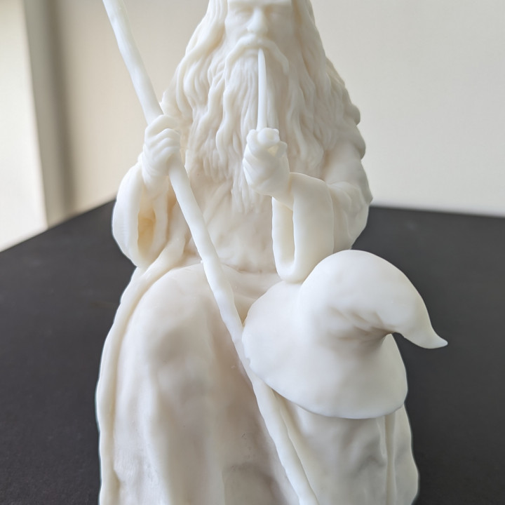 3D Printable Grey Wizard sitting by Sanny Campbell