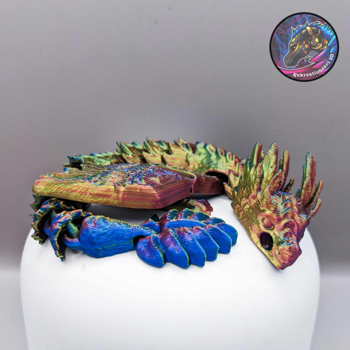 3D Printable Flexi Baby Feather Dragon Keychain by Kirsten M