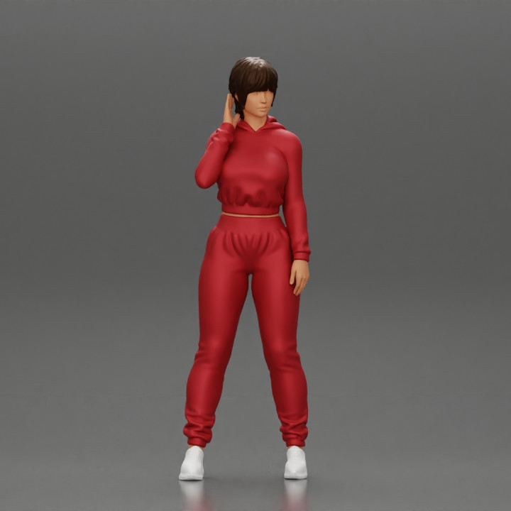 3D Printable sexy girl in a sports outfit hoodie is standing by ...