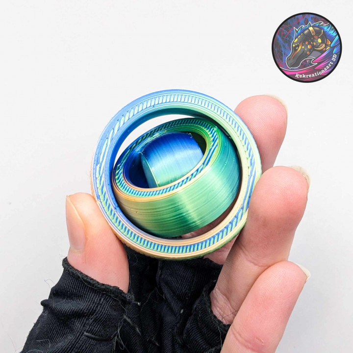 3D Printable Basic Gyroid Fidget Spinner Keychains by Kirsten M