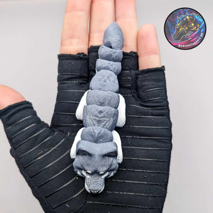 3D Printable Baby Flexi Wolf Keychain by Kirsten M