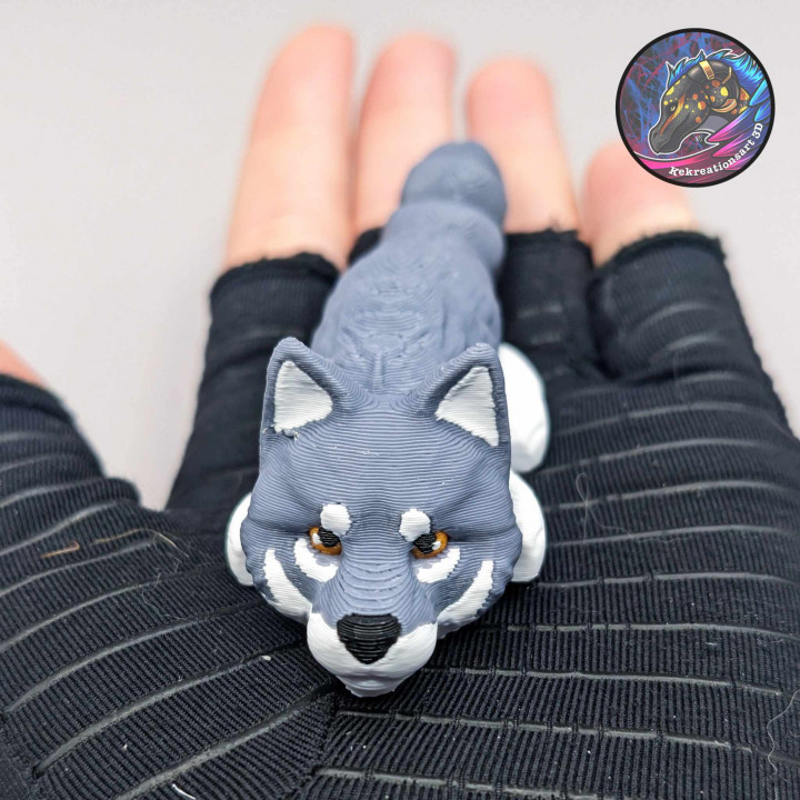 3D Printable Baby Flexi Wolf Keychain by Kirsten M
