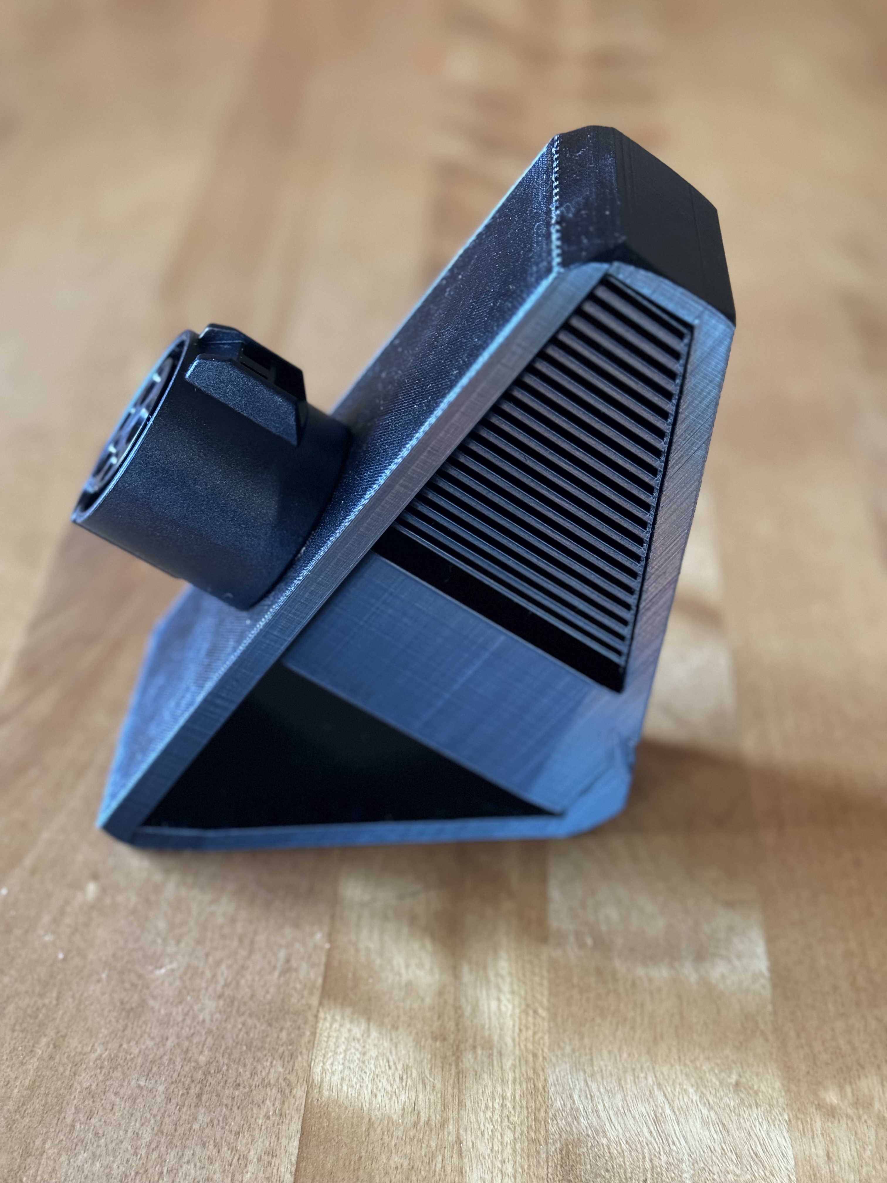 3D Printable Model Y Tesla Charging Adapter Door Dock by Harry Dresden