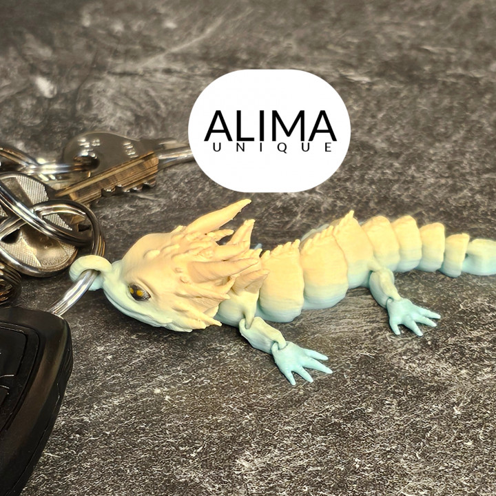 3D Printable Keychain - Flexi little baby dragon by ALIMA UNIQUE DESIGNS
