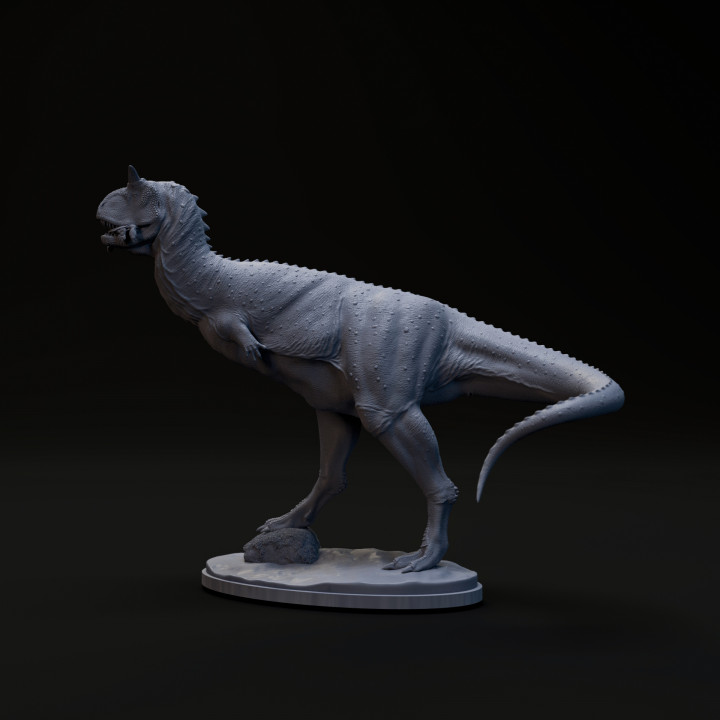 3D Printable Carnotaurus eating 1-35 scale pre-supported dinosaur by ...