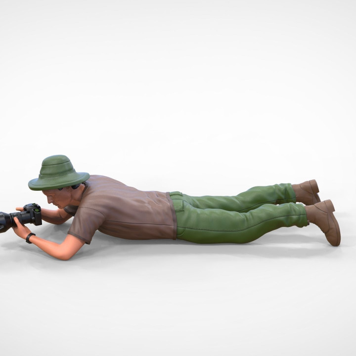 3D Printable N3 photographer lying down taking photo 3D print model by ...