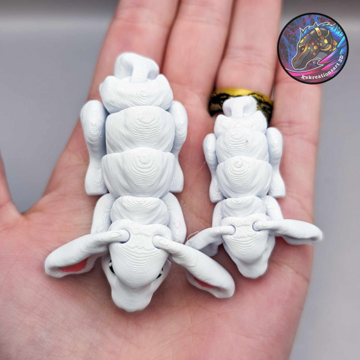 3D Printable Flexi Baby Bunny Keychains by Kirsten M
