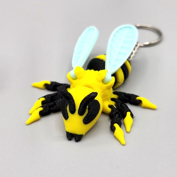 3D Printable Cute Flexi Bee And Bee keychain Variant by Fillifuu