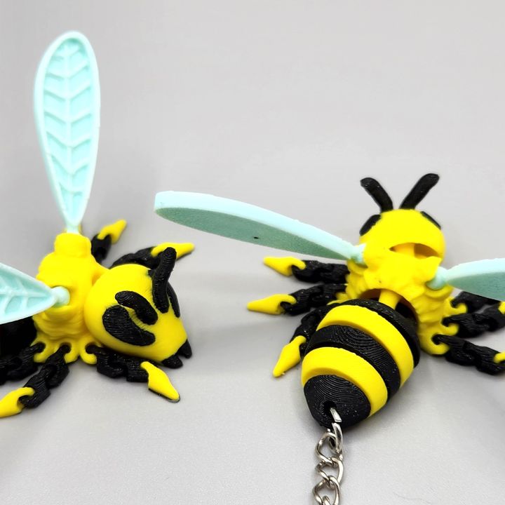 3D Printable Cute Flexi Bee And Bee keychain Variant by Fillifuu