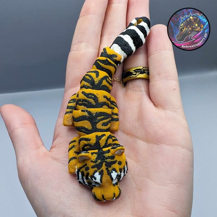3D Printable Baby Flexi Tiger Keychain by Kirsten M
