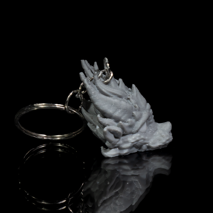 3D Printable Tiny Dragon Keychain by Stlflix