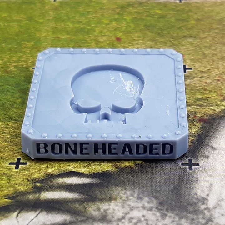 3D Printable Bone Headed Blood Bowl Status Tile Token by Vergond