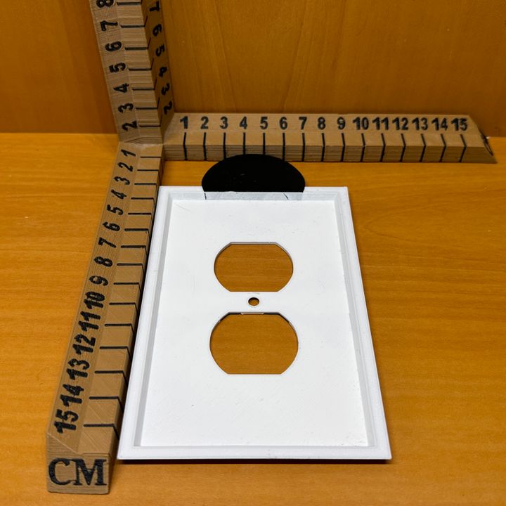 3D Printable Outlet Cover Skull Crossbones by Star Labs 3D, LLC