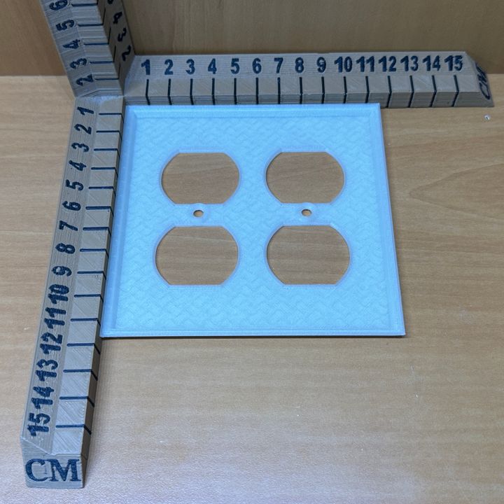 3D Printable Outlet Cover Double by Star Labs 3D, LLC