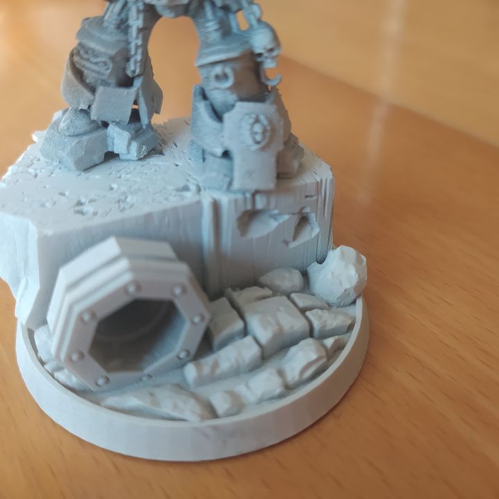 3D Printable FREE Sewer Base (50mm) by Mythic Miniatures