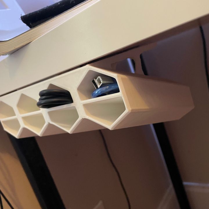 3D Printable Cable organizer by Sunday Ochedi