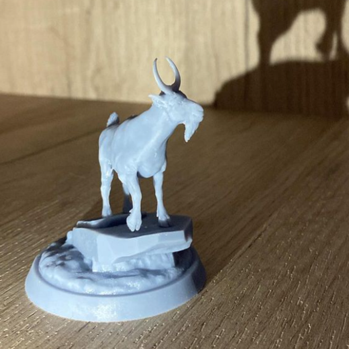 3D Printable Fantasy goat with moon horns standing on rock - pre ...