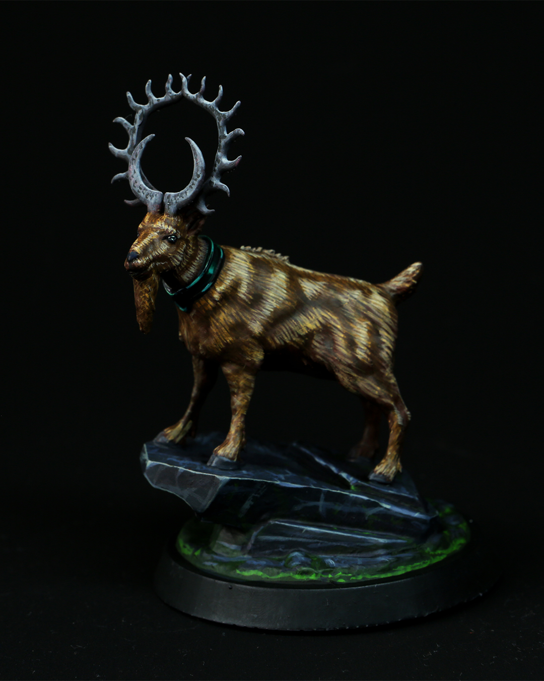 3D Printable Fantasy goat with sun and moon horns standing on rock ...