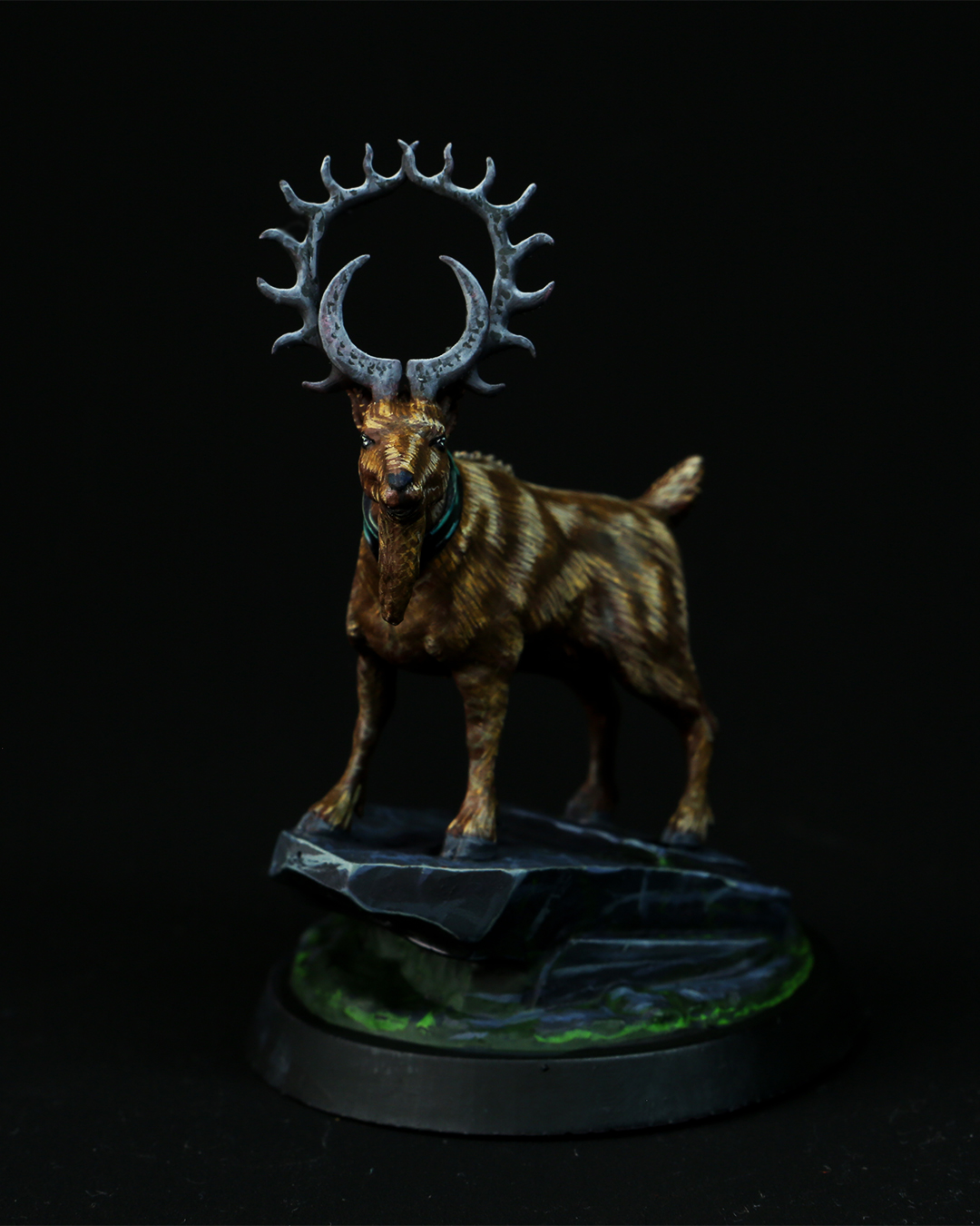 3D Printable Fantasy goat with sun and moon horns standing on rock ...