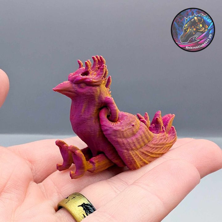3D Printable Baby Flexi Phoenix Keychain by Kirsten M