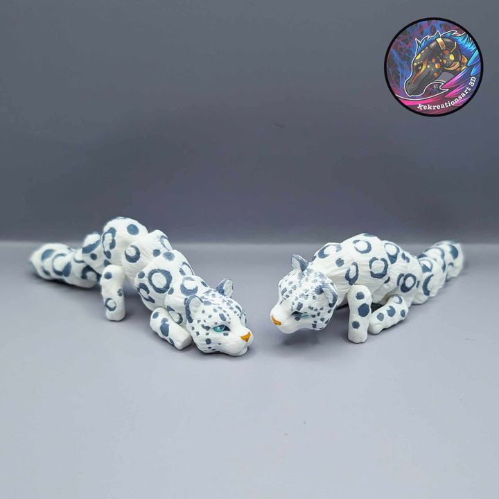 3D Printable Baby Flexi Snow Leopard Keychain by Kirsten M