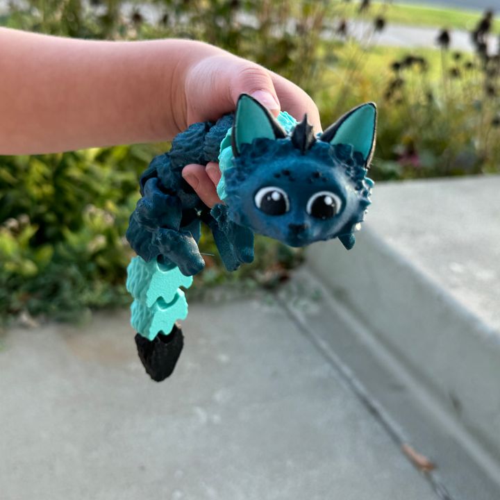 3D Printable Tavi the articulated Teal Cat by Teal Cat Creative