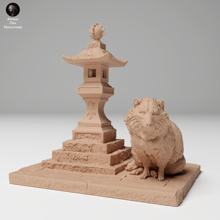 3D Printable Tanuki Next To Japanese Lanter by Animal Den Miniatures