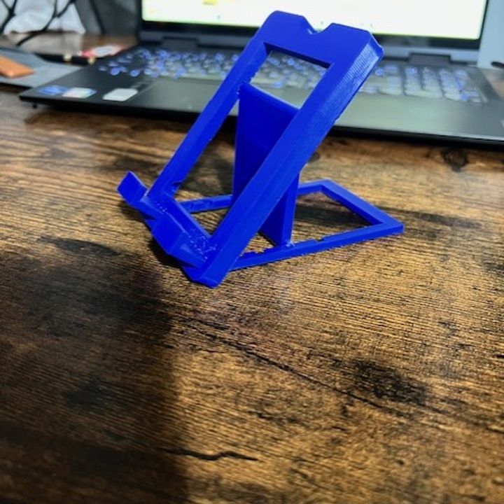3D Printable foldable phone holder by Matthan Jude