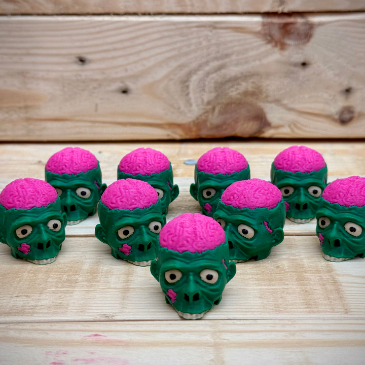 3D Printable Mini Zombie Heads by ENIQUE3D