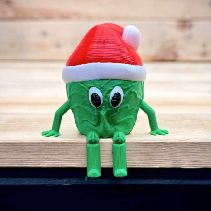 3D Printable Sitting Sprout in Santa Hat by ENIQUE3D