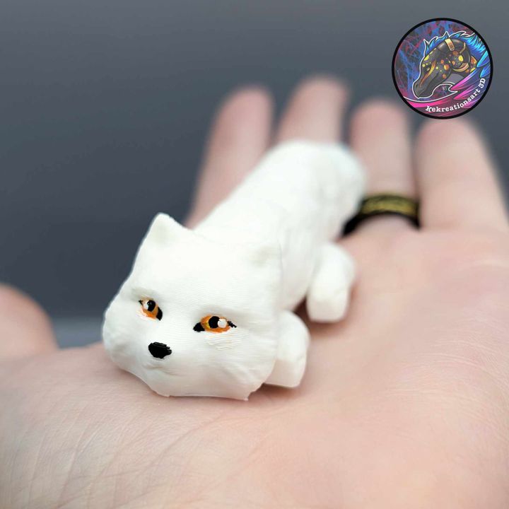 3D Printable Baby Flexi Arctic Fox Keychain by Kirsten M
