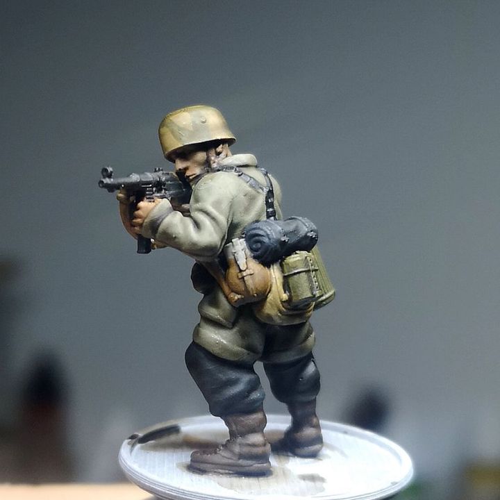 3D Printable WW2 28mm German Paratrooper firing MP40 by Colonel Muller