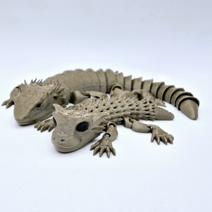 3D Printable Pocket Pet Bearded Dragon Keychain by Fillifuu