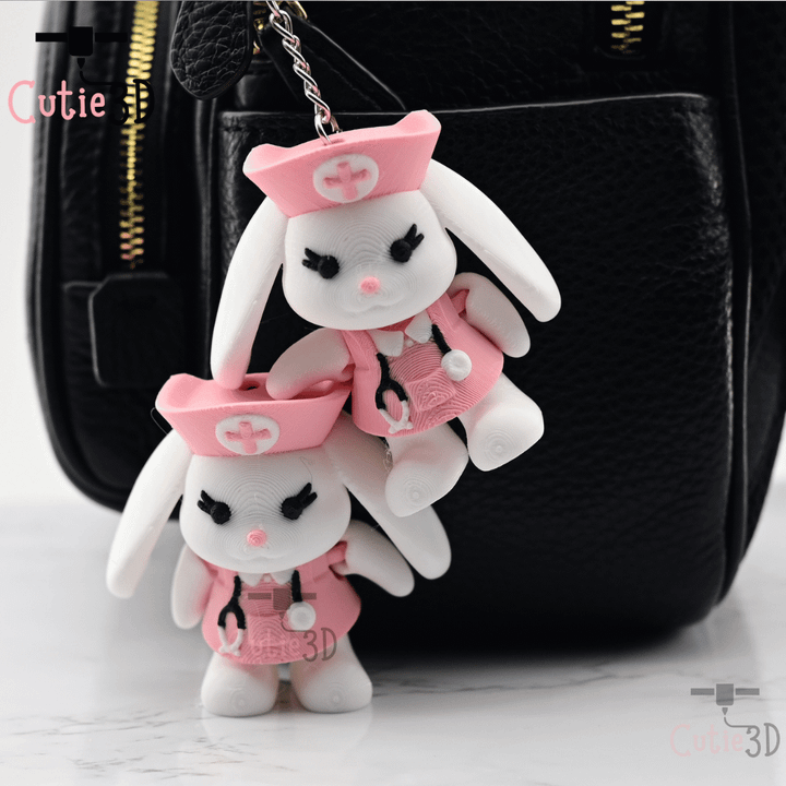3D Printable Cutie3D Articulated Rabbit Nurse Keychain by Cutie3D