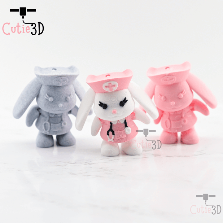 3D Printable Cutie3D Articulated Rabbit Nurse Keychain by Cutie3D