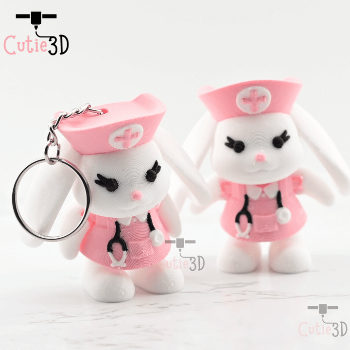 3D Printable Cutie3D Articulated Rabbit Nurse Keychain by Cutie3D
